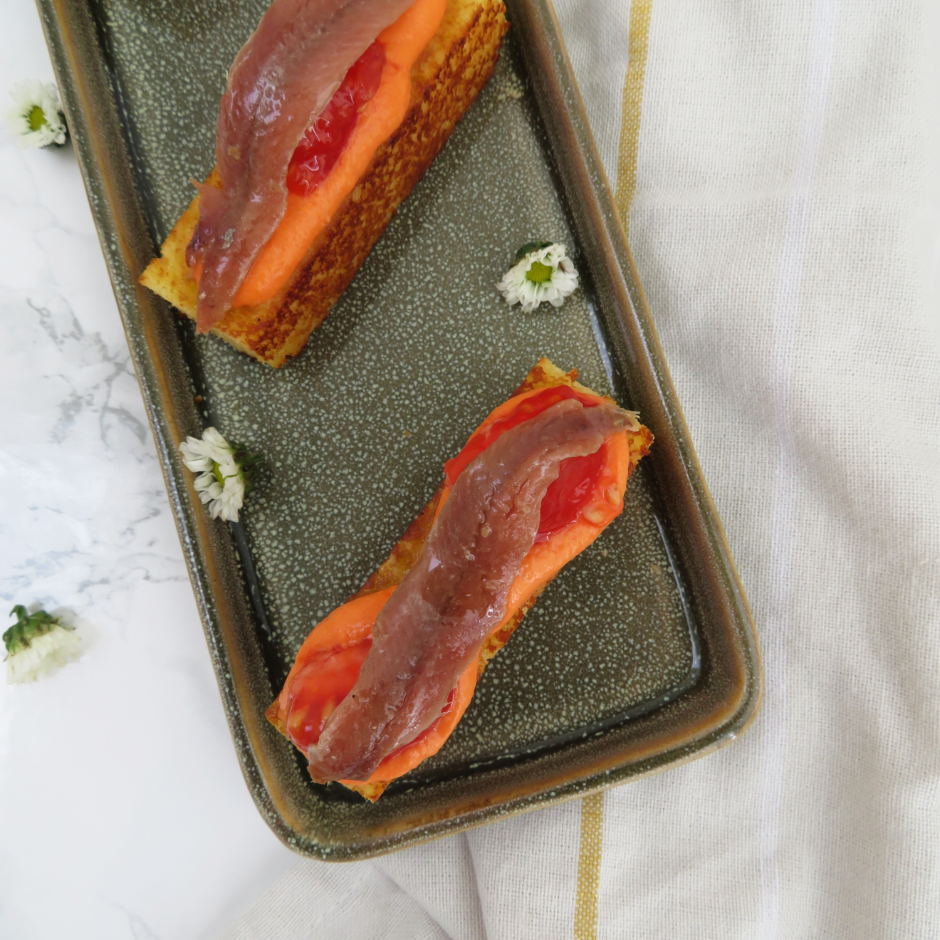 Anchovy with Tomato over grilled pound cake toast - RootsandCook